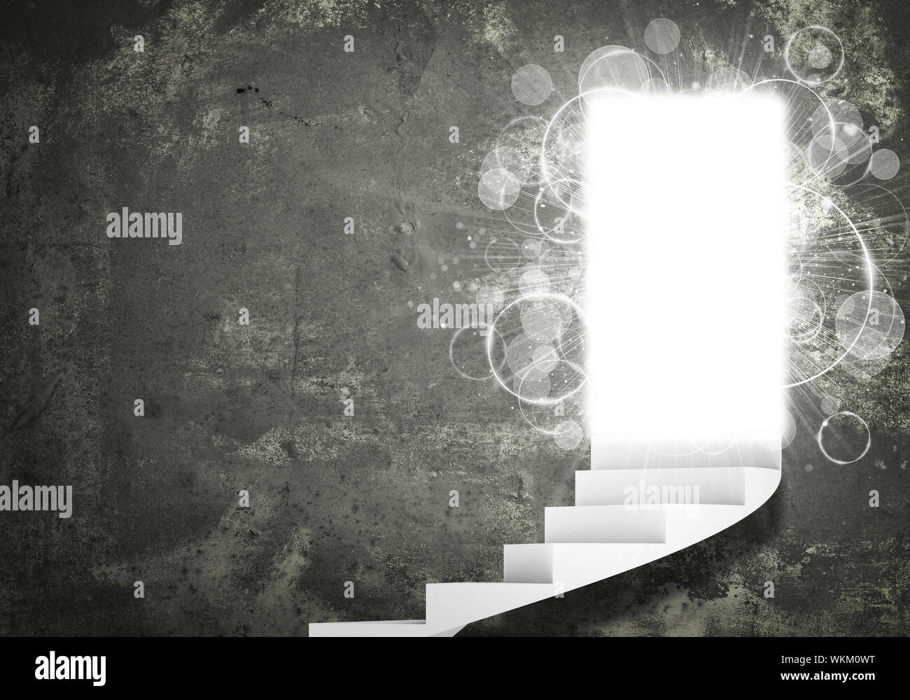 Spiral stairs and magic doors leading to a light Stock Photo - Alamy