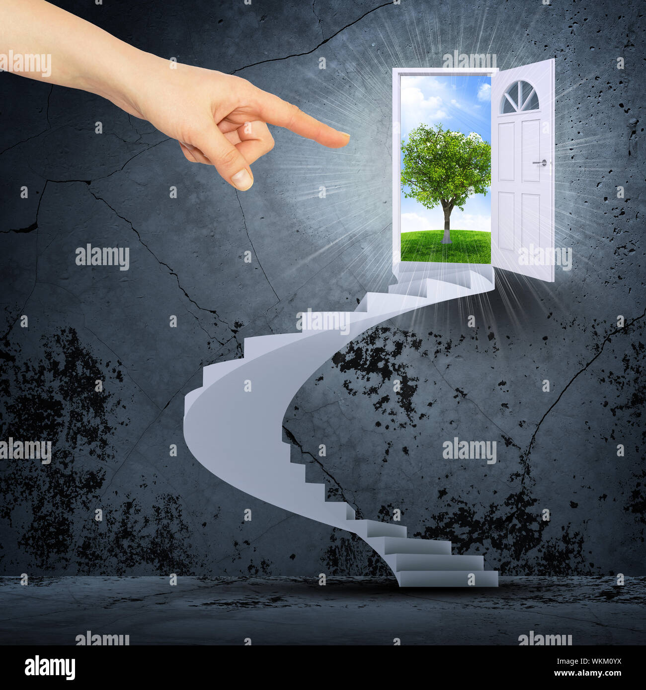 Finger pointing to spiral stairs and magic doors Stock Photo - Alamy