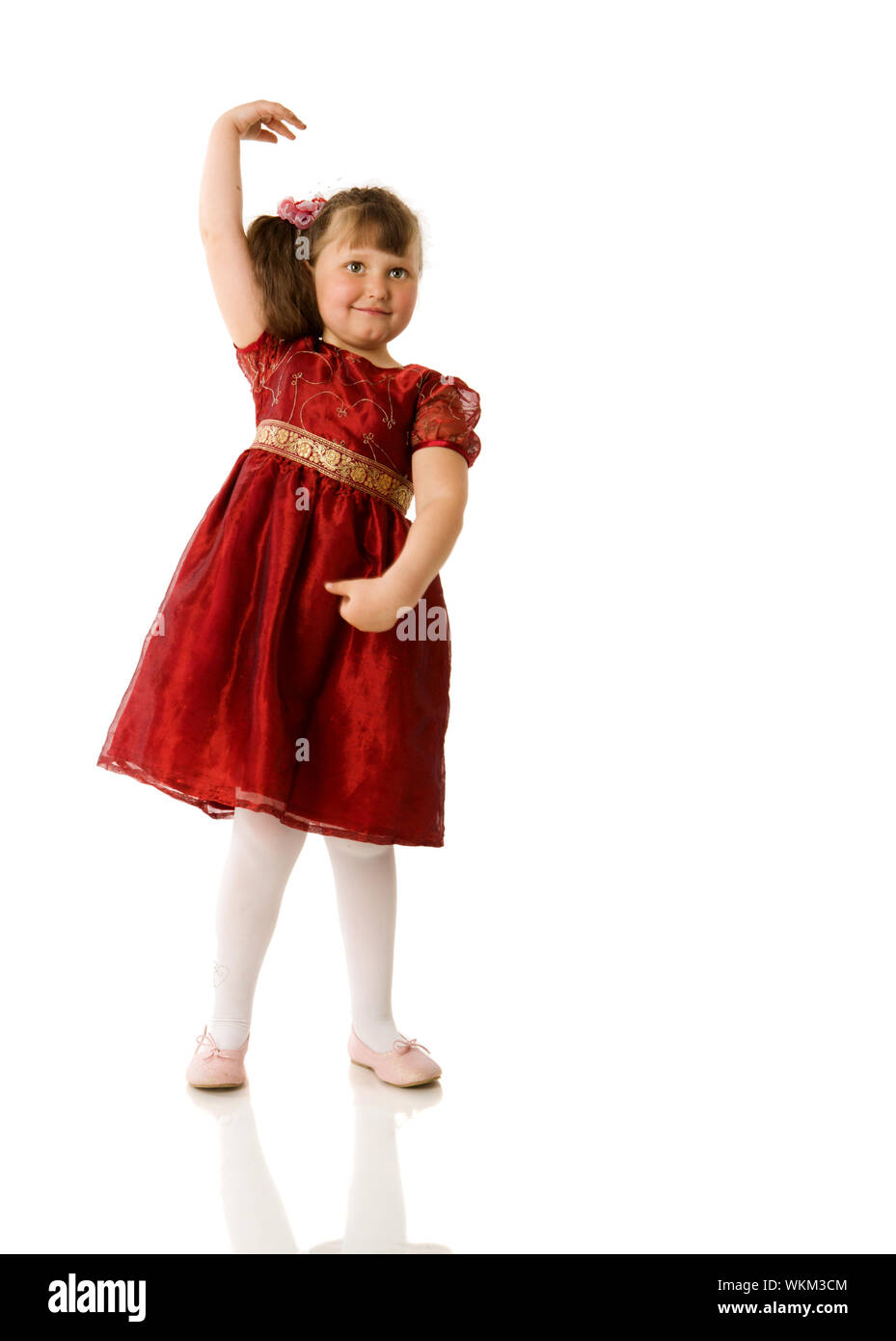 Cheerful girl dancing on floor isolated on white Stock Photo - Alamy