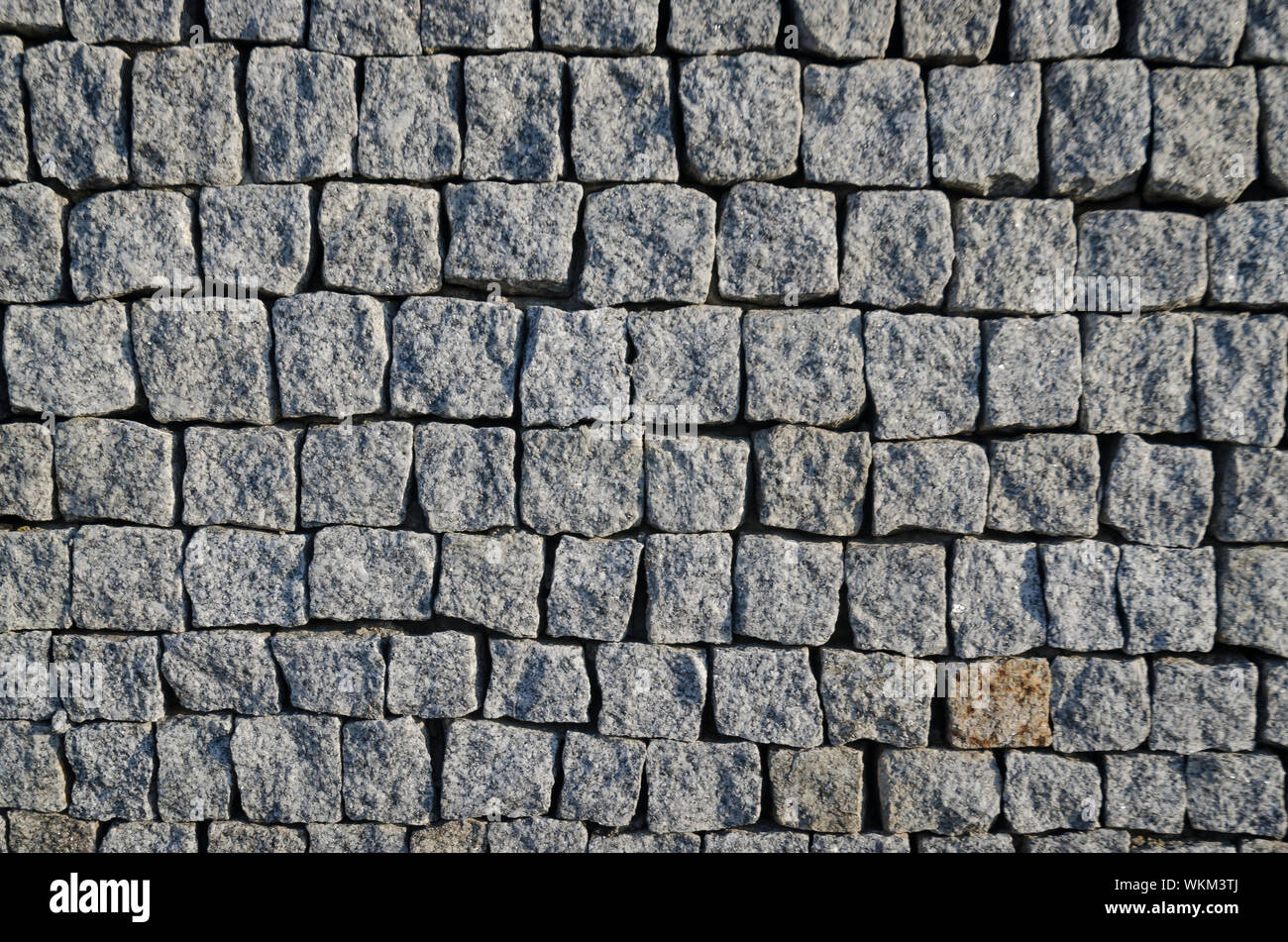 Cobbled pavement pattern made of granite cubes Stock Photo - Alamy