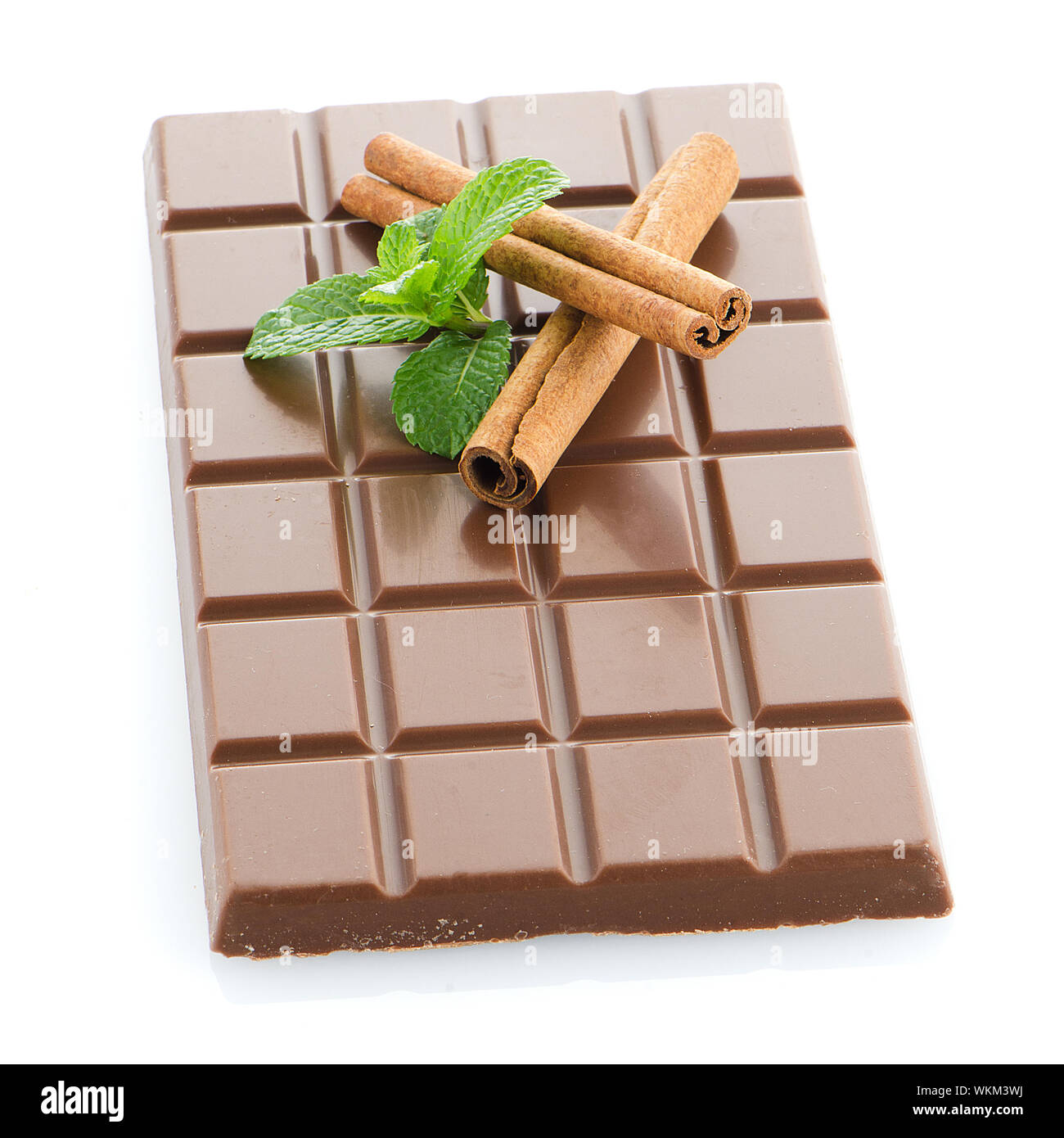 Closeup detail of chocolate and mint leaves on white background Stock ...