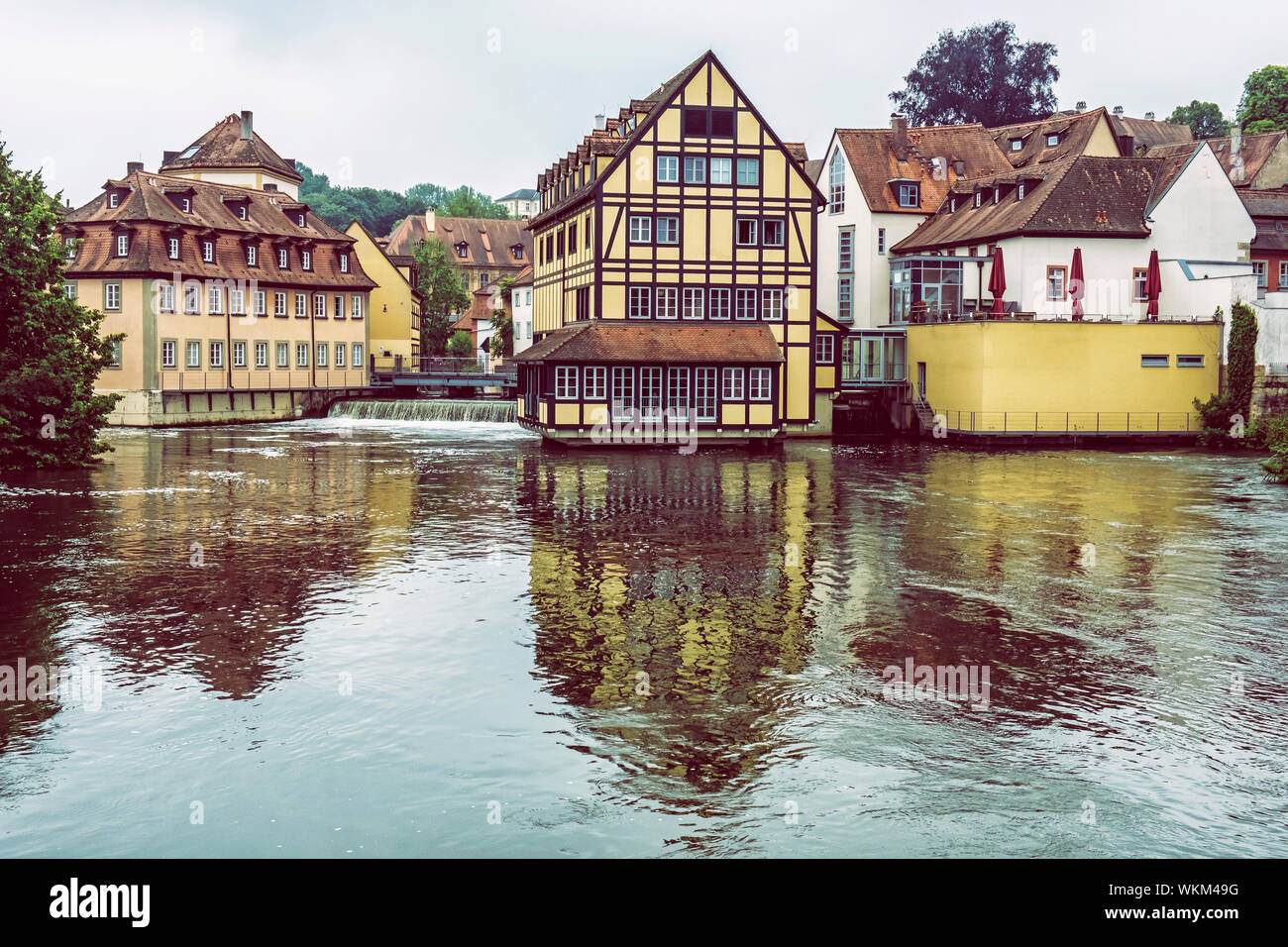 Traditional buildings and Regnitz river in Bamberg, Bavaria, Germany ...