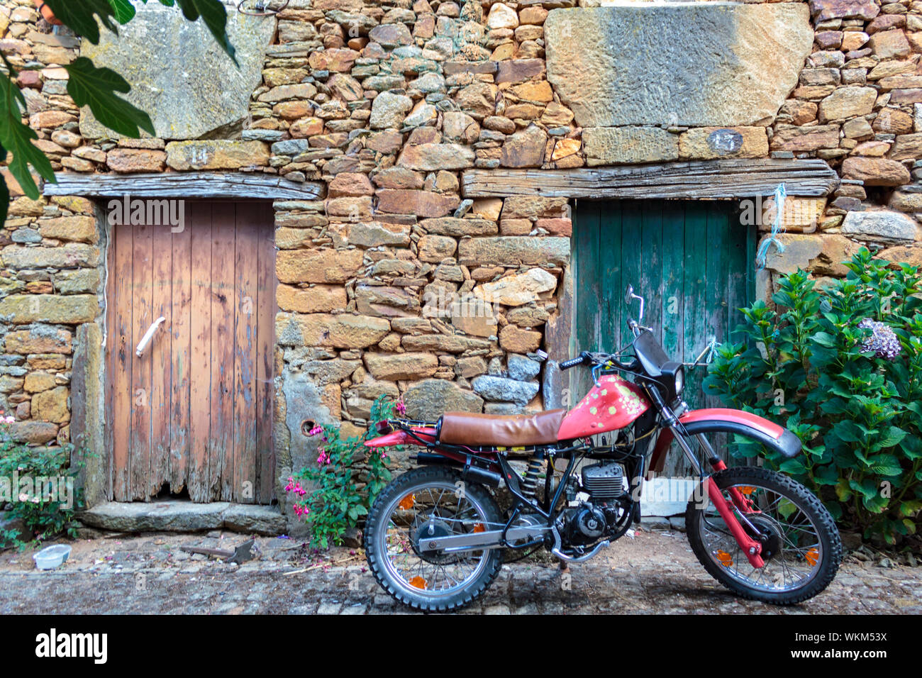 Old wooden doors and wheel hi-res stock photography and images - Alamy