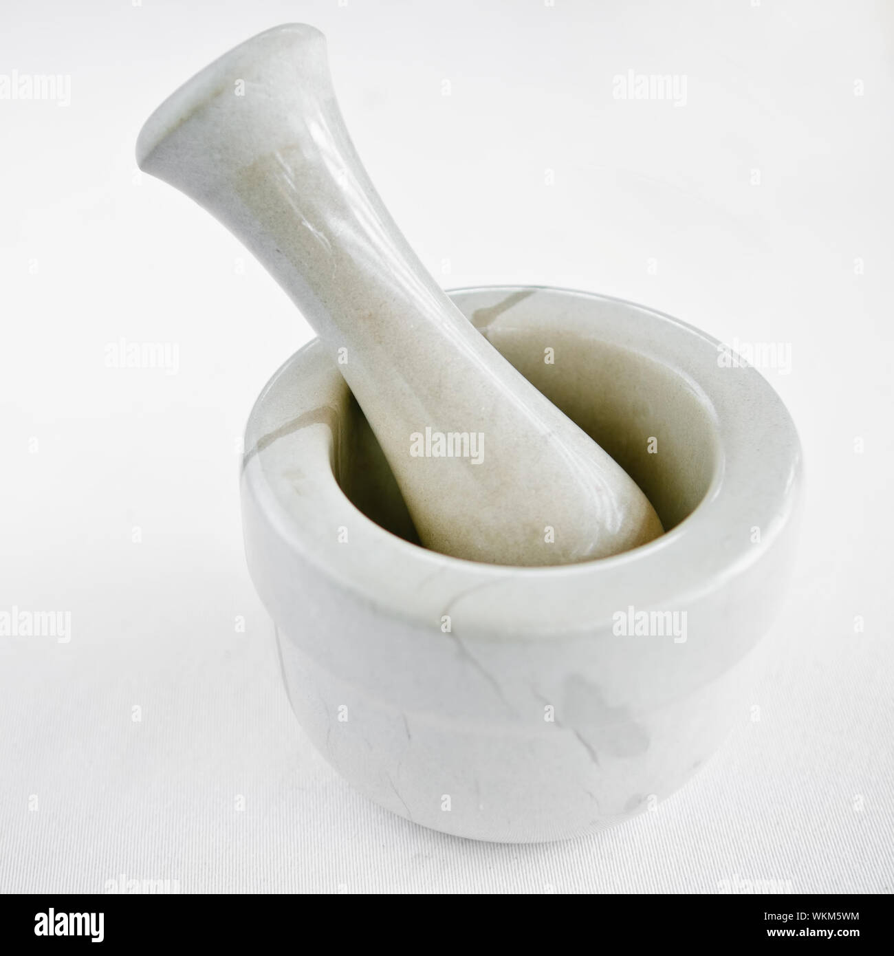 Classic stone mortar and pestle for spices Stock Photo - Alamy