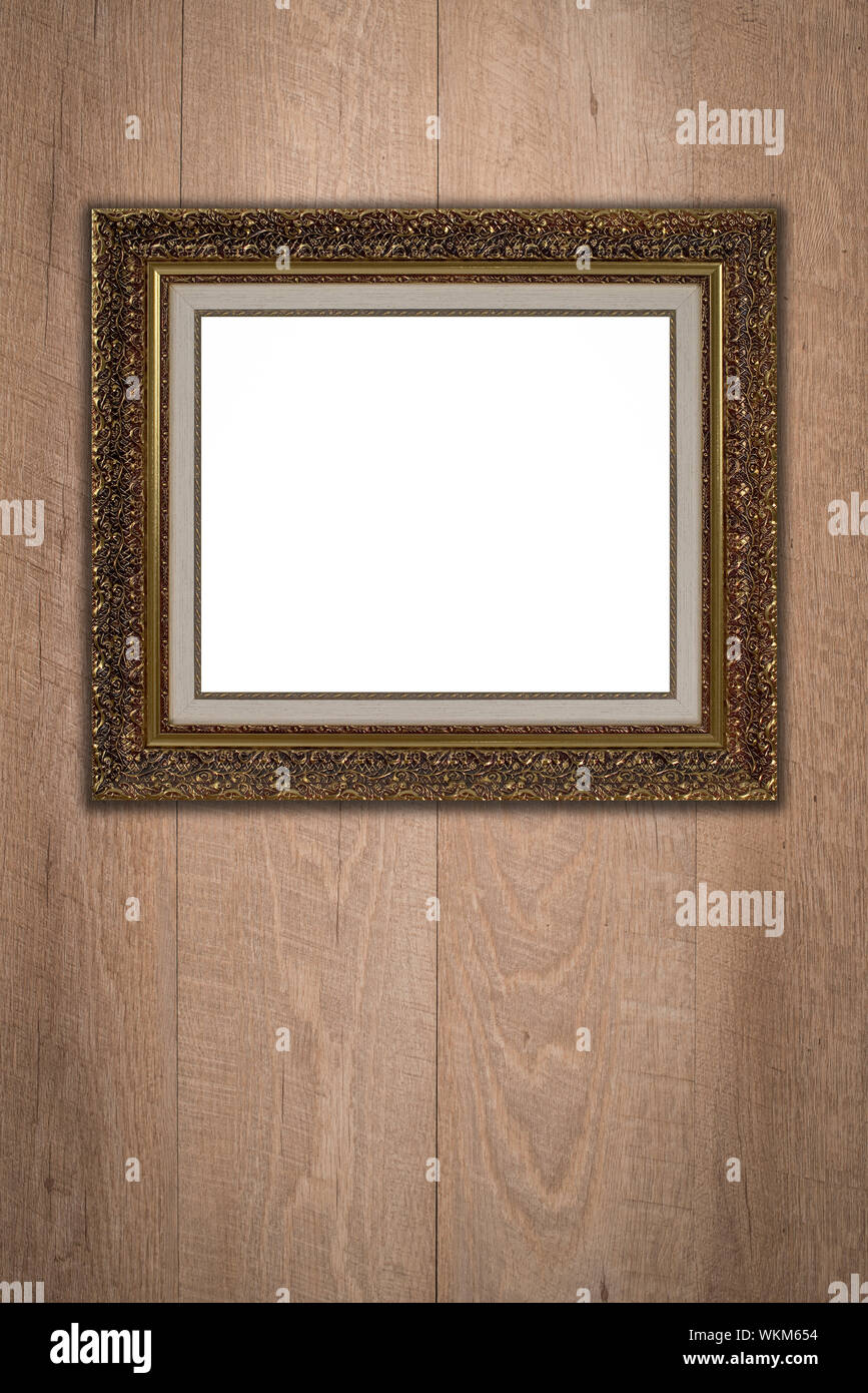 Old picture frame on vintage wood wall Stock Photo - Alamy