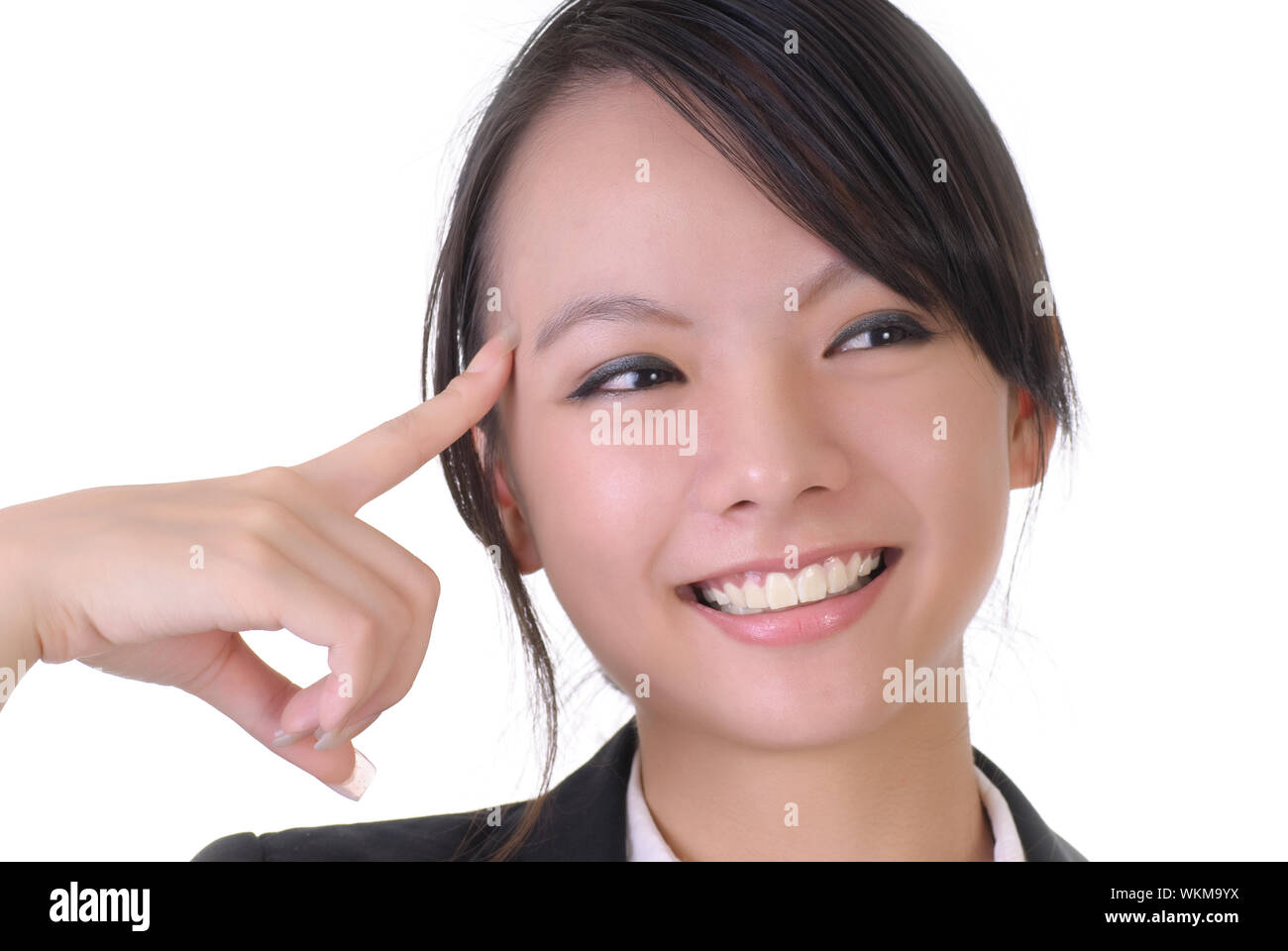 Closeup portrait of young Asian lady put finger on head Stock Photo - Alamy