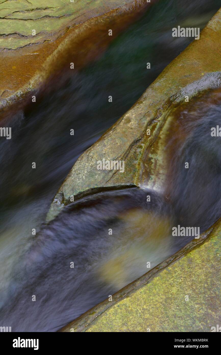 Rock gullies formed by water in the riverbed hi-res stock photography ...