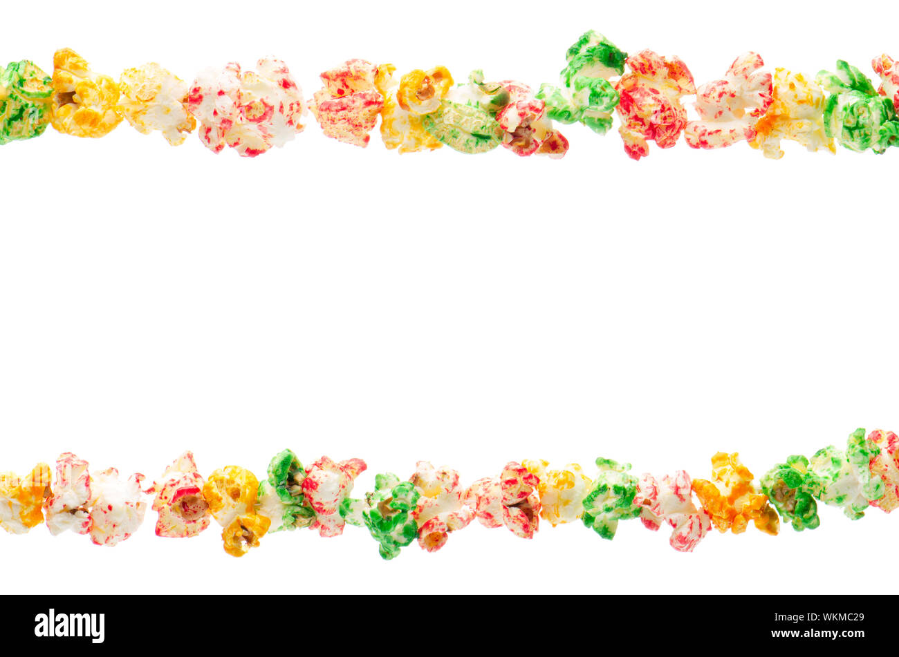 Popped color kernels on two rows isolated on white background Stock ...