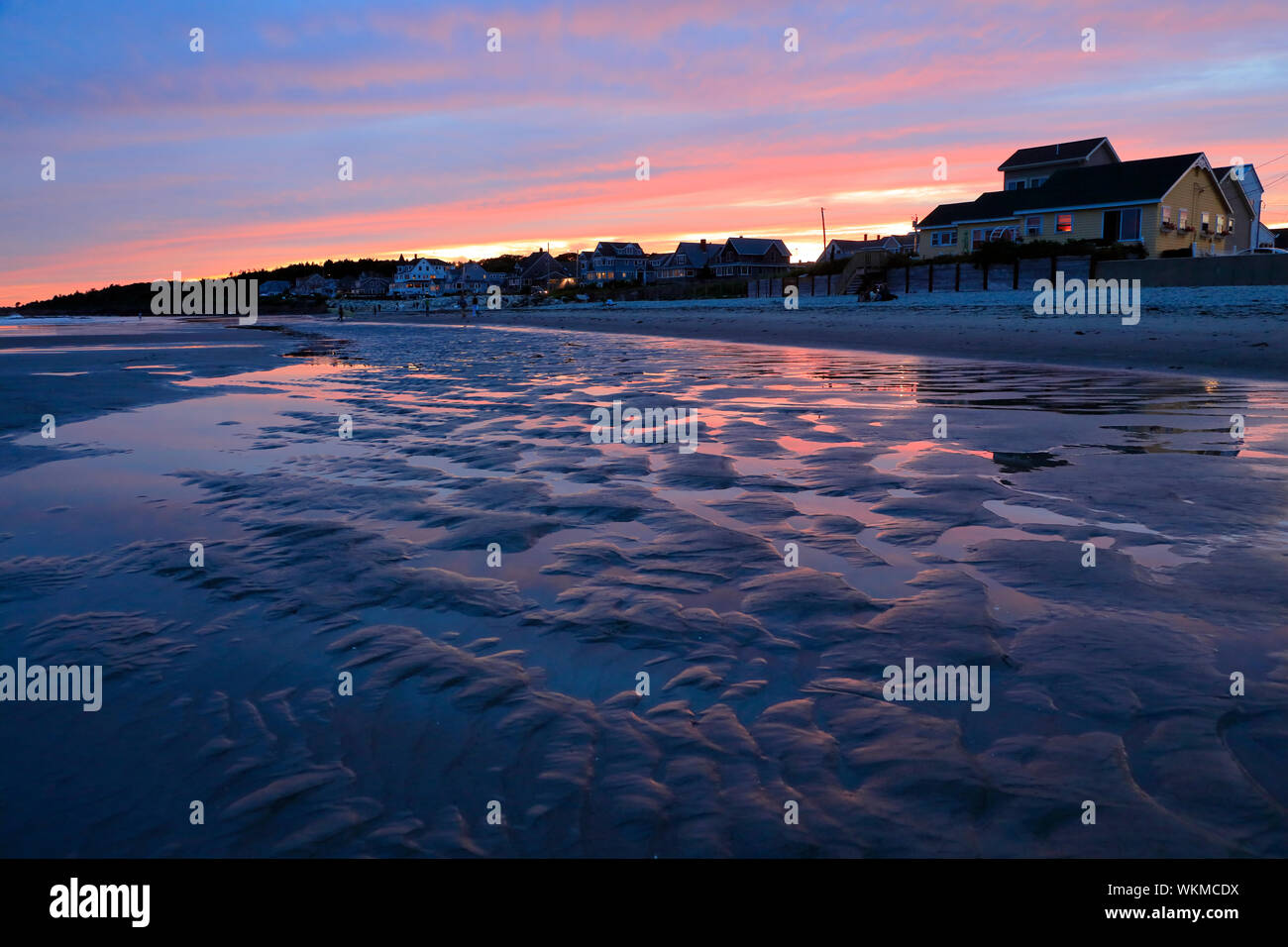 Sunset at Higgins Beach with residential houses in background ...