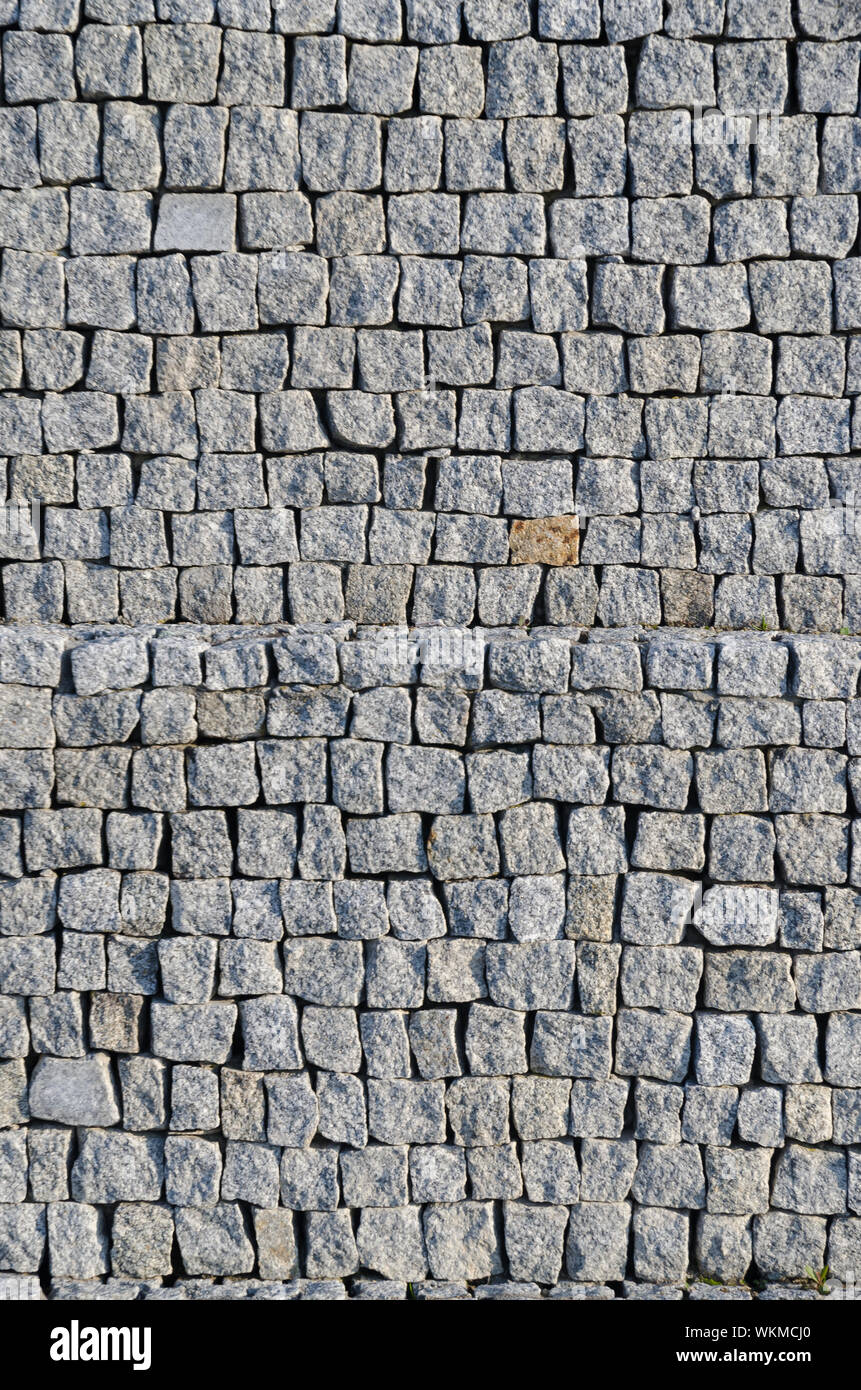 Cobbled pavement pattern made of granite cubes Stock Photo - Alamy