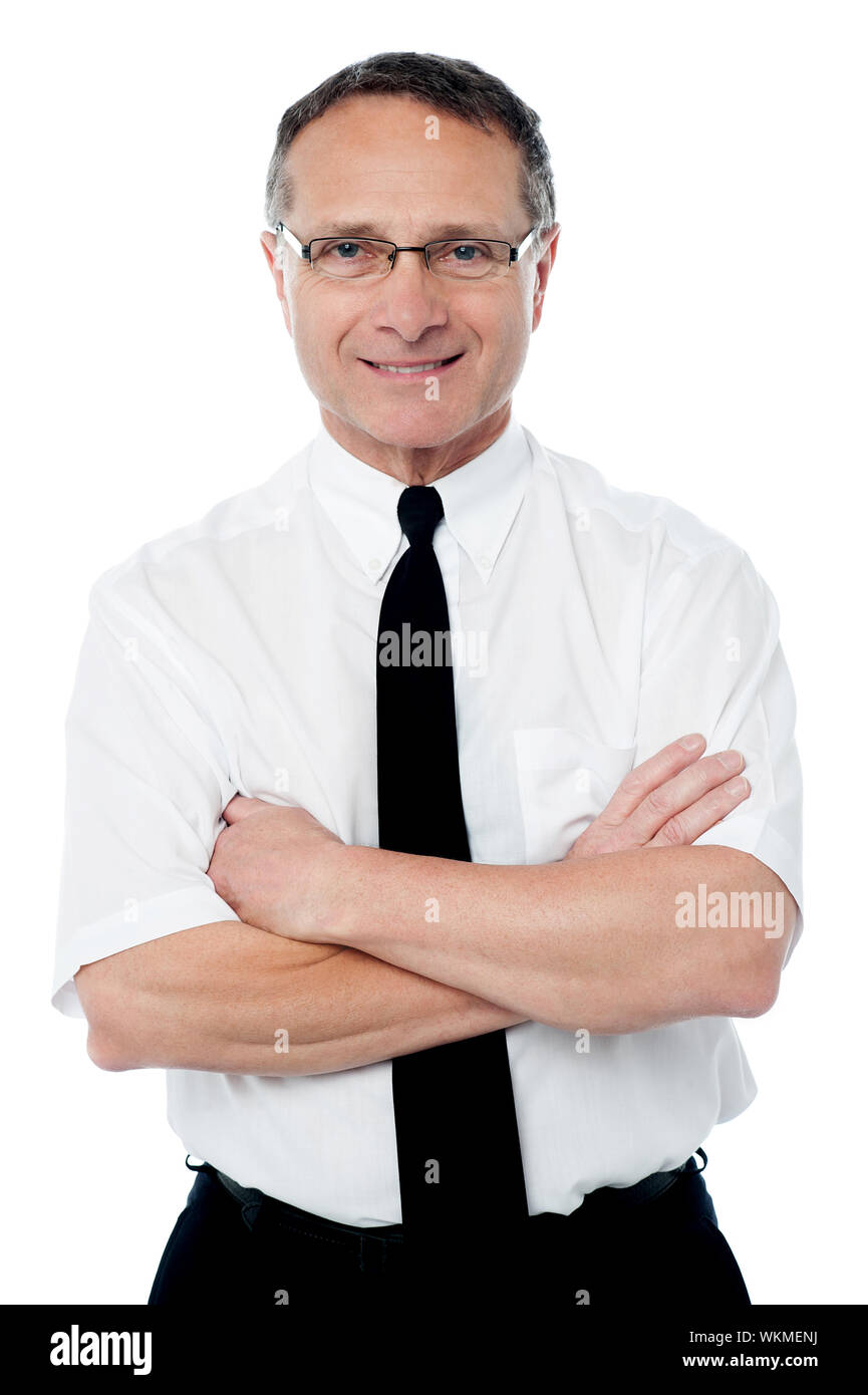 Handsome corporate executive posing with folded arms Stock Photo - Alamy
