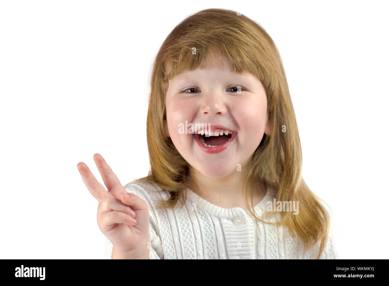 Happy laughing girl making Victory sign isolated on white Stock Photo ...
