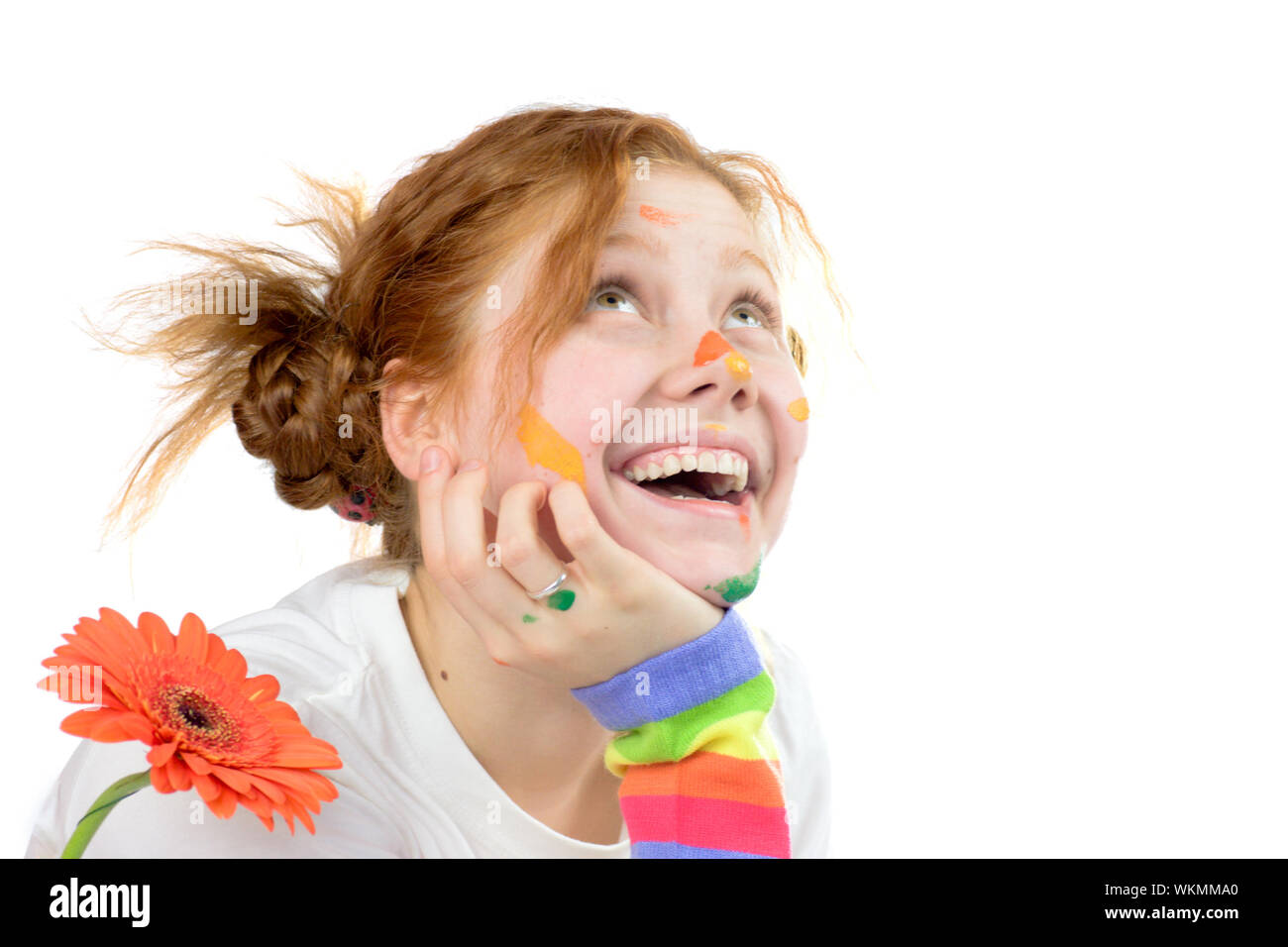 Funny artist with painted face and gerber isolated on white Stock Photo ...