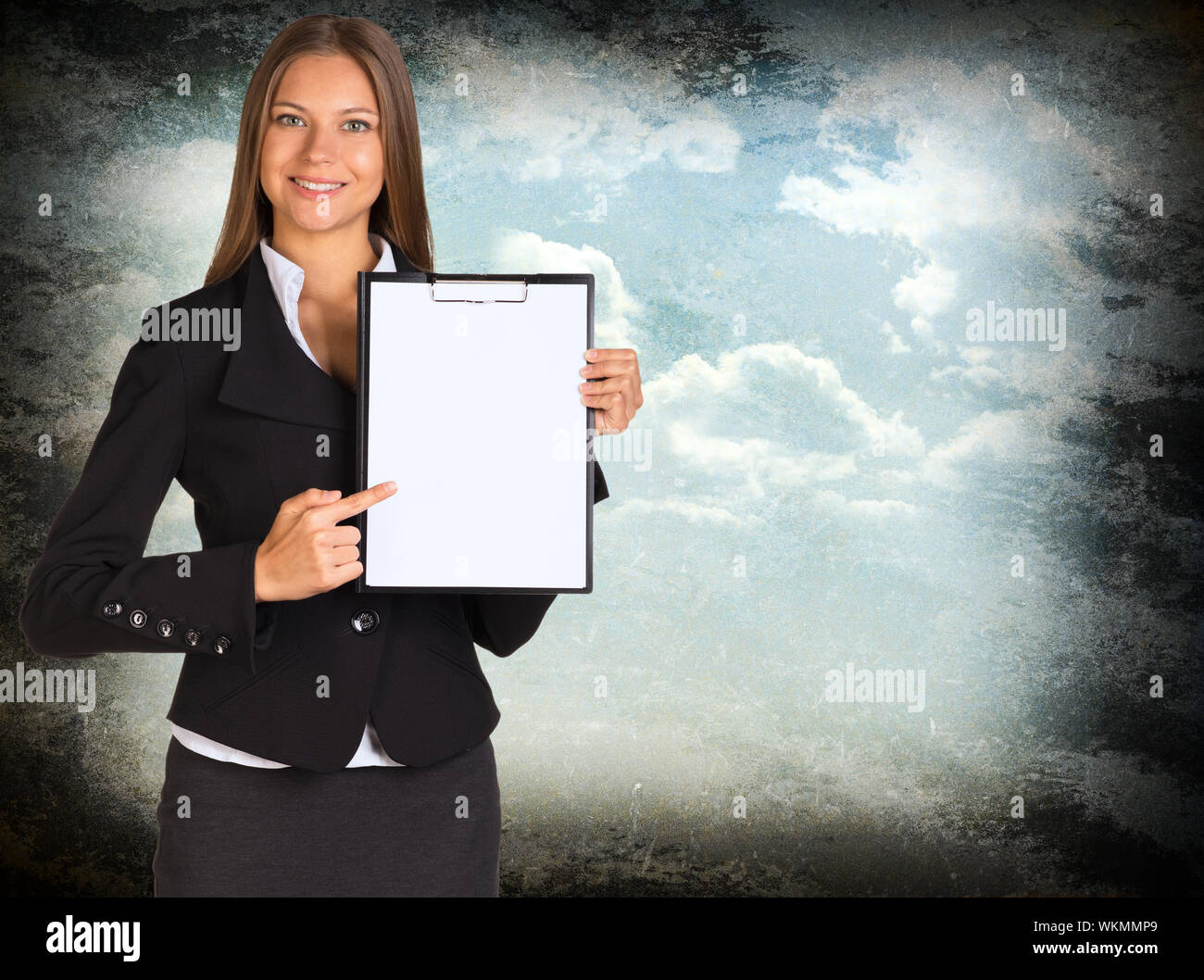 Businesswoman holding paper holder. Blue sky and white clouds as ...
