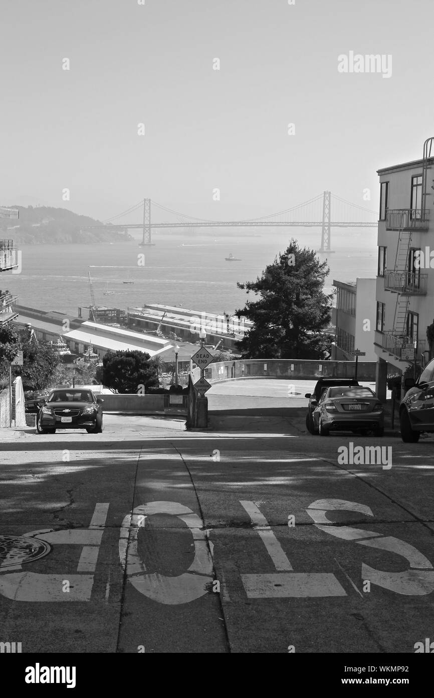 Car at stop sign Black and White Stock Photos & Images - Alamy
