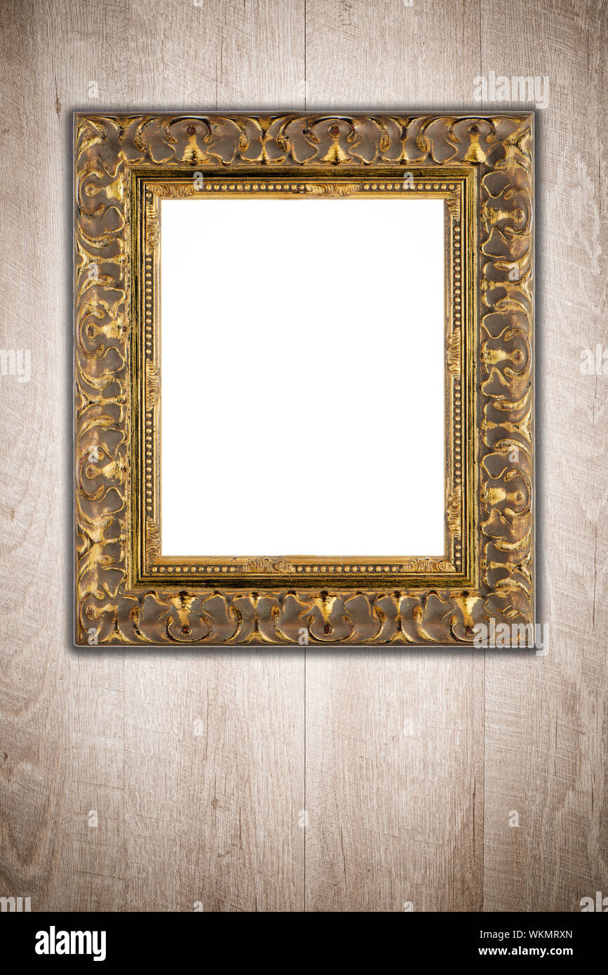 Old picture frame on vintage wood wall Stock Photo - Alamy