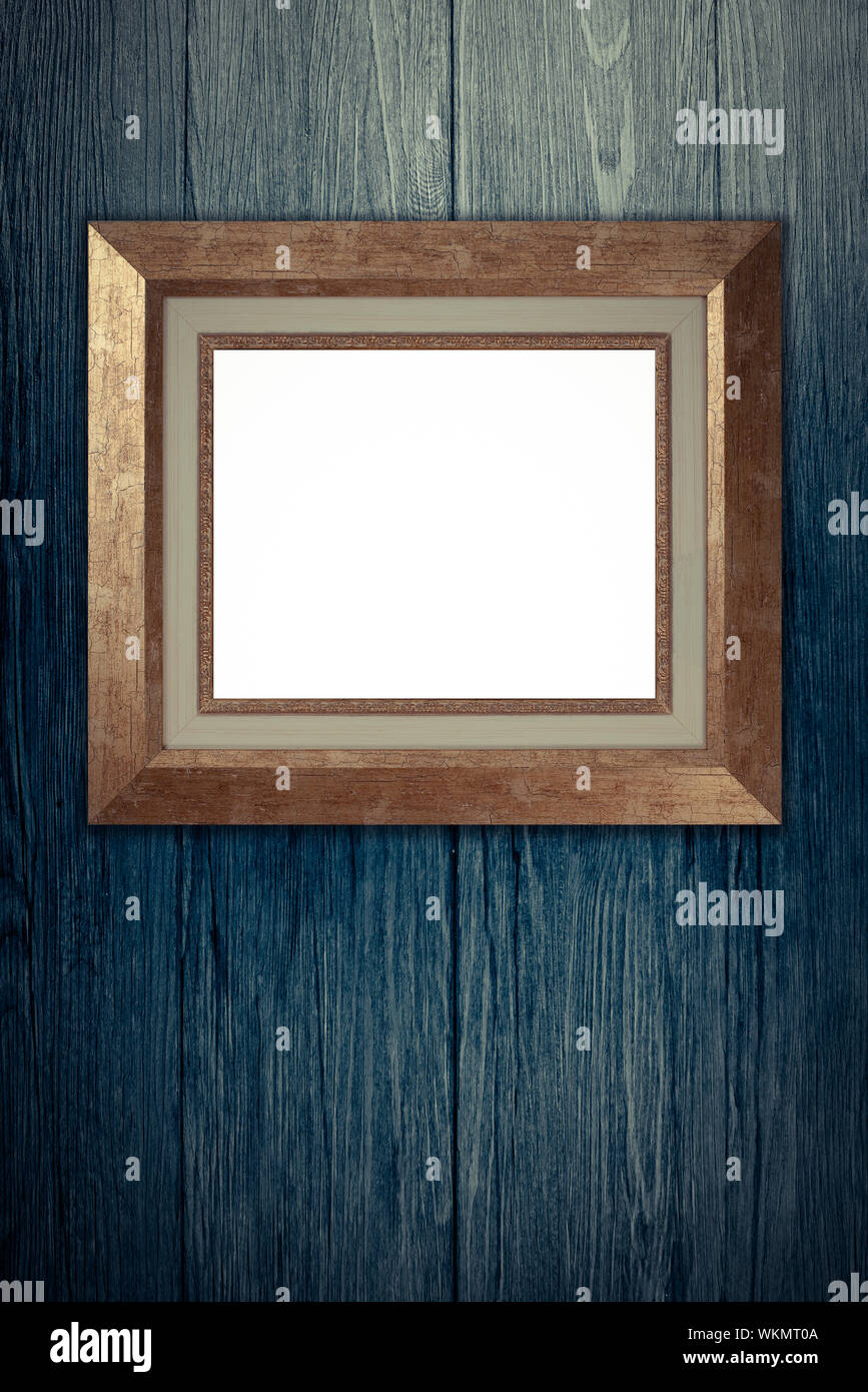 Old picture frame on vintage wood wall Stock Photo - Alamy