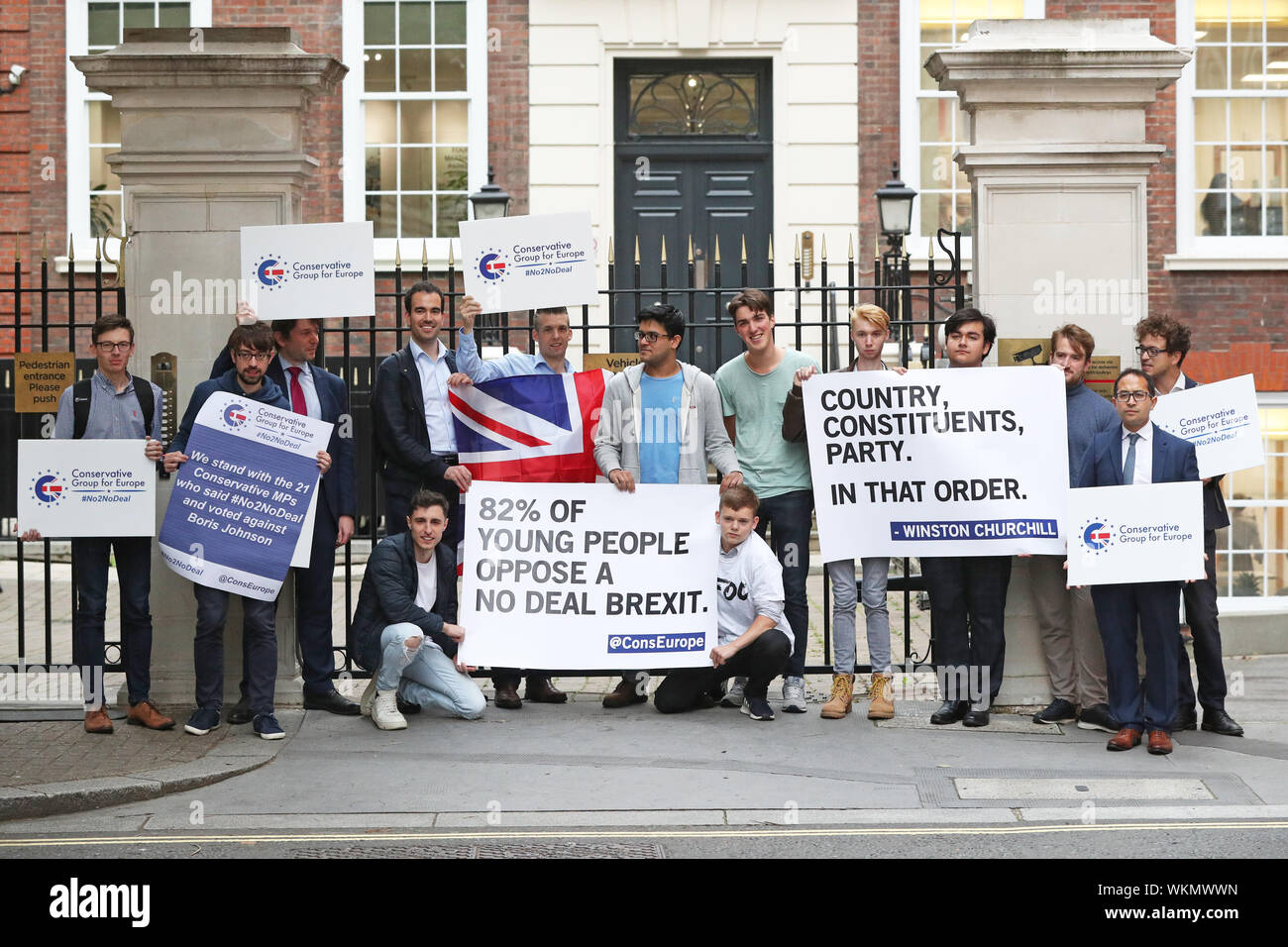 Young Conservative members protest outside the Conservative Campaign ...