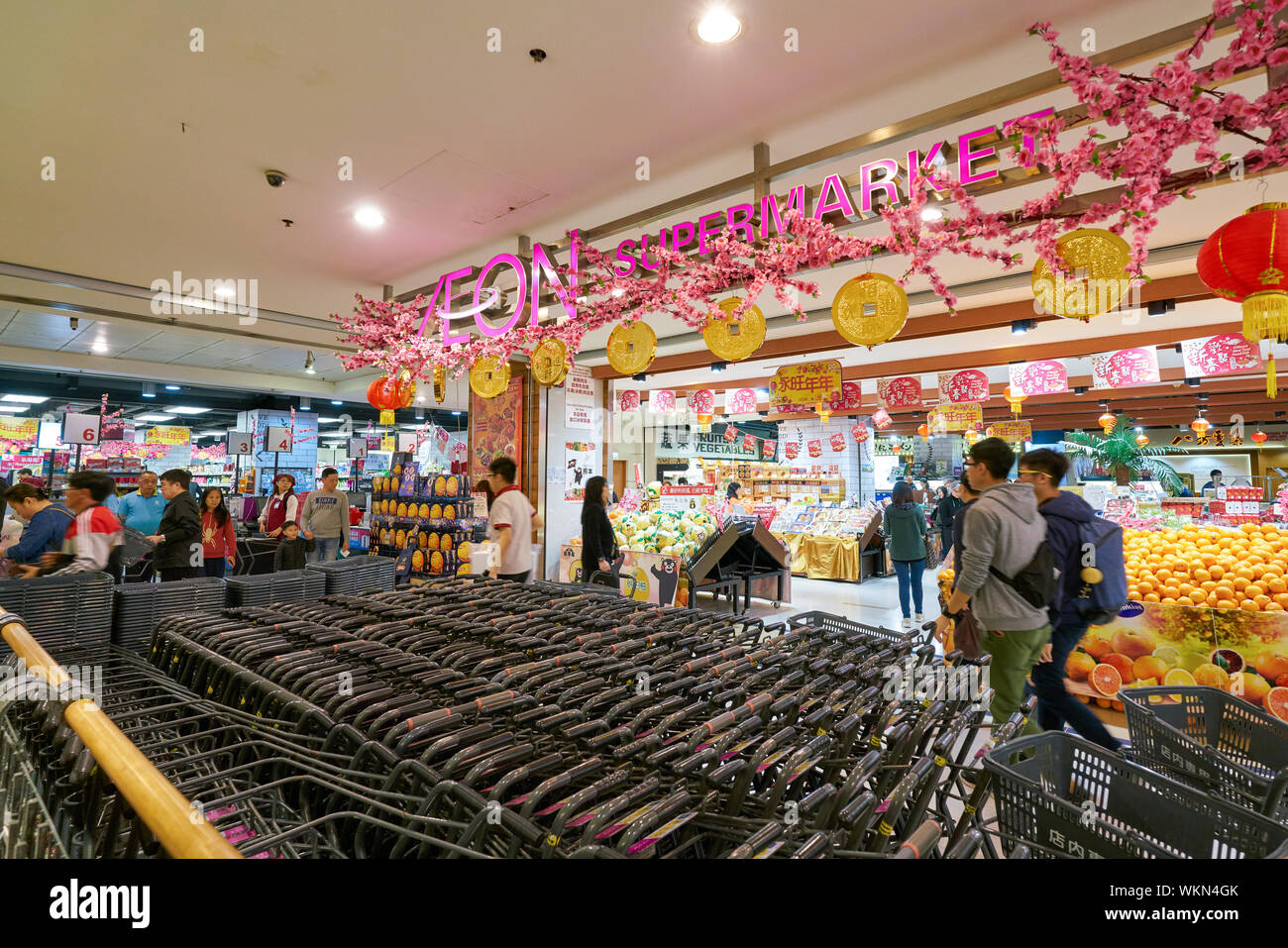 HONG KONG, CHINA - CIRCA FEBRUARY, 2019: trolleys at AEON supermarket ...
