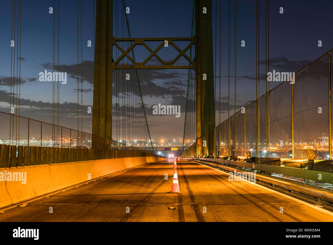Highway maintenance traffic cones lined up on the Vincent Thomas Bridge ...