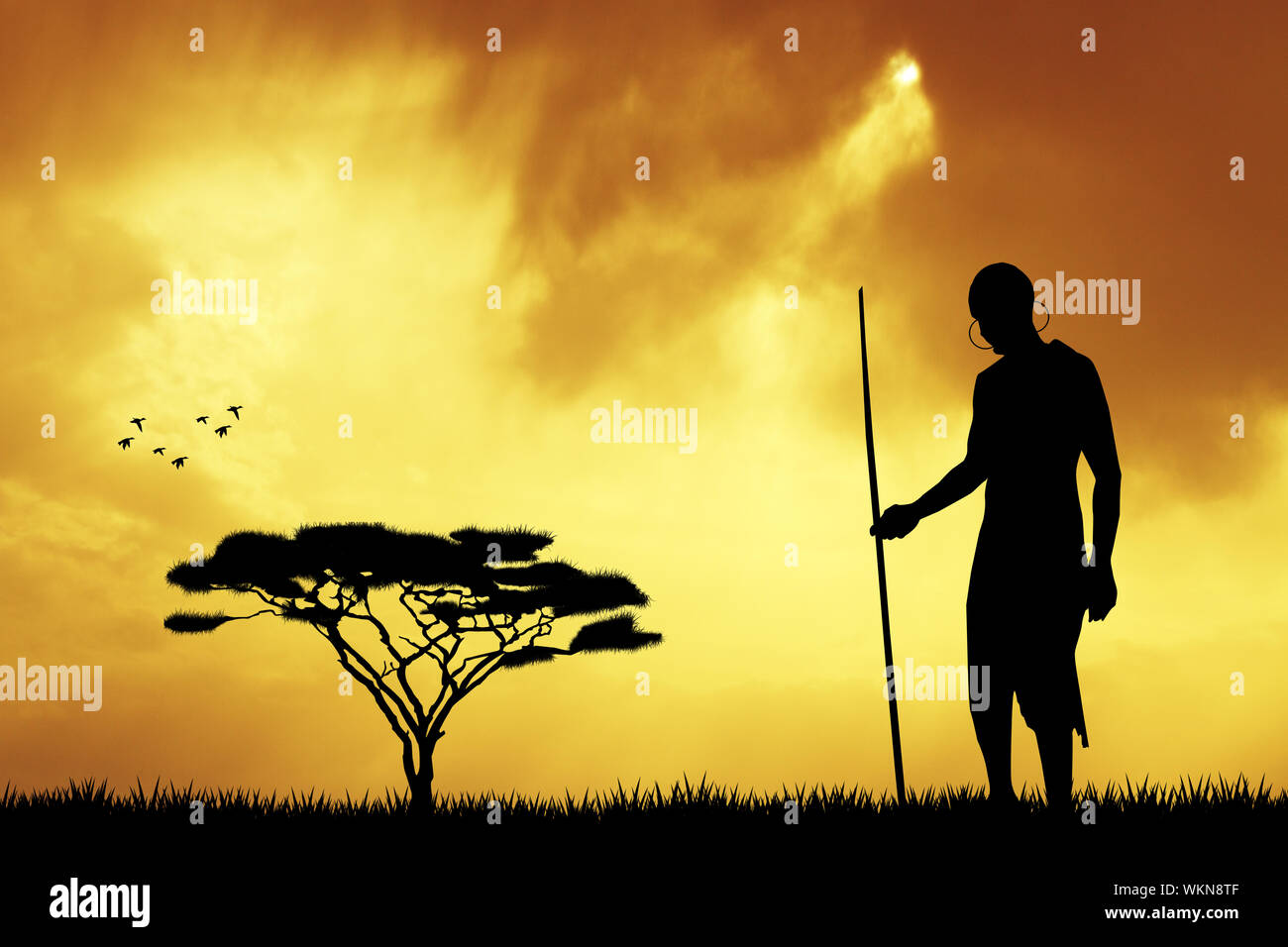 Indigenous man at sunset Stock Photo - Alamy