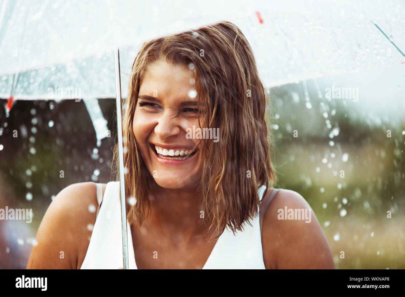 Cheerful wet teen girl hi-res stock photography and images - Alamy