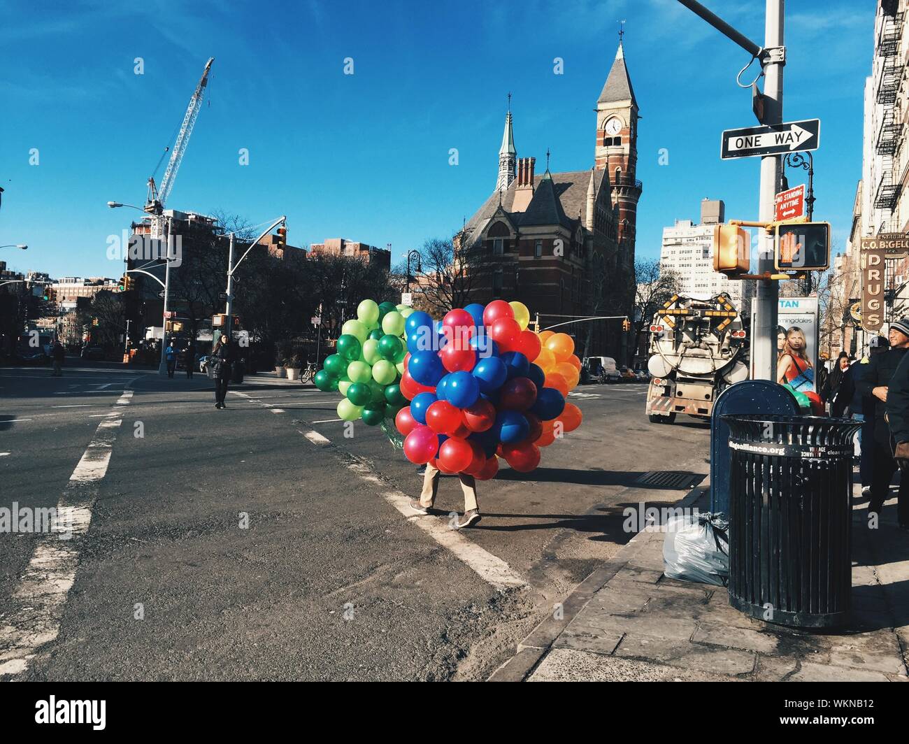 Man with balloons city hi-res stock photography and images - Alamy