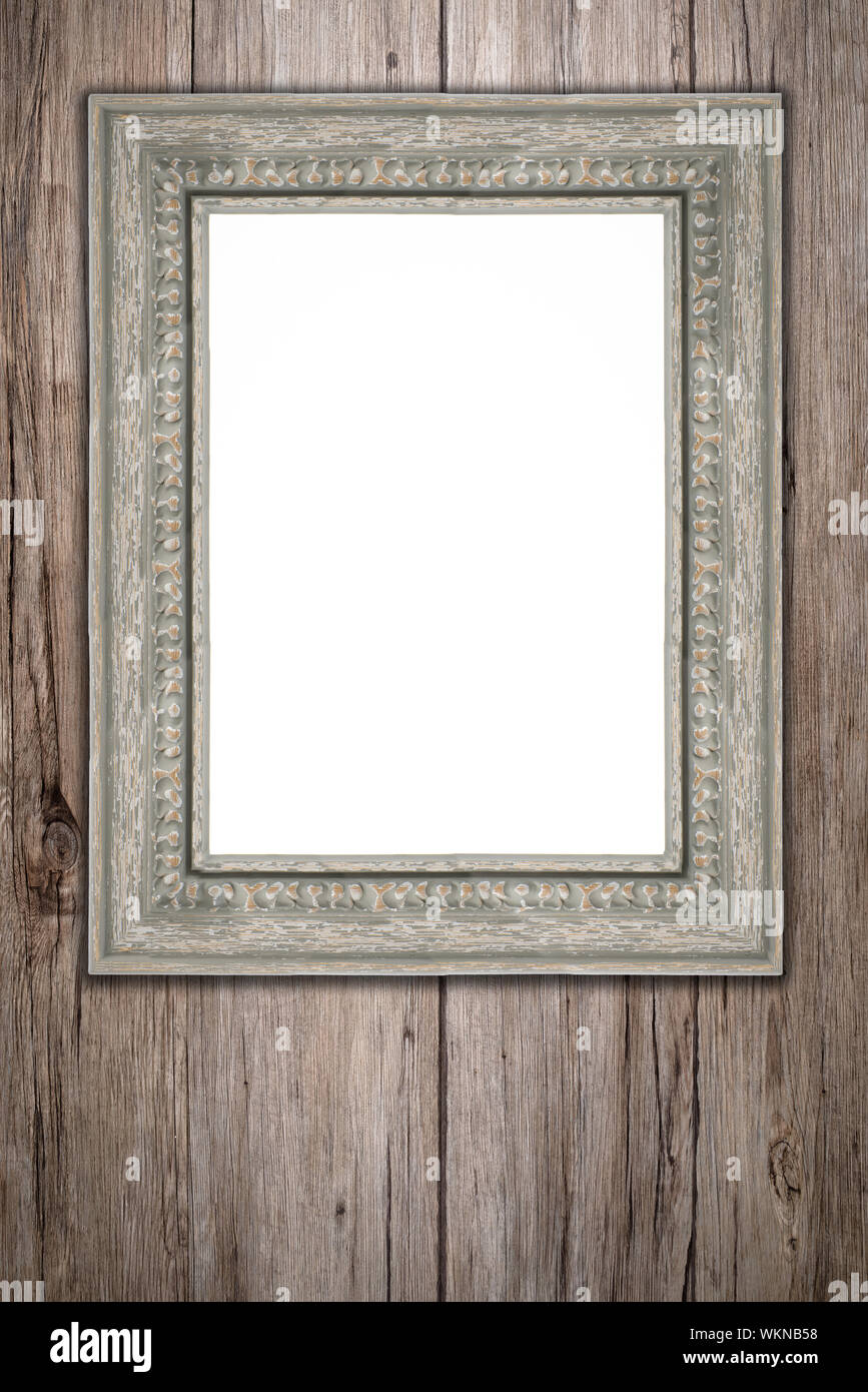 Old picture frame on vintage wood wall Stock Photo - Alamy