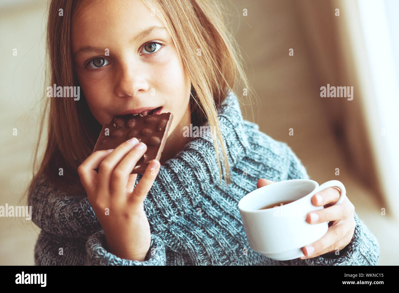 Child drinking tea Stock Photo - Alamy