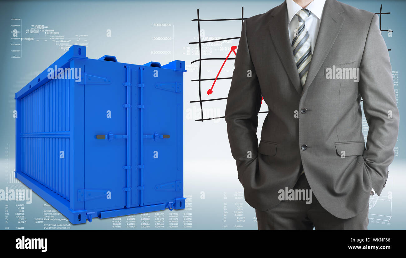 Businessman in suit. Freight shipping container and graphs as backdrop ...