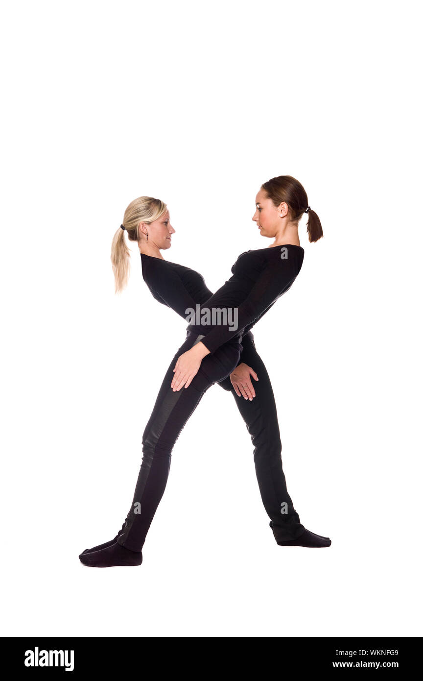 The letter 'X' formed by people dressed in black Stock Photo - Alamy