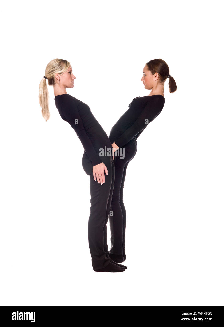 The letter 'Y' formed by people dressed in black Stock Photo - Alamy