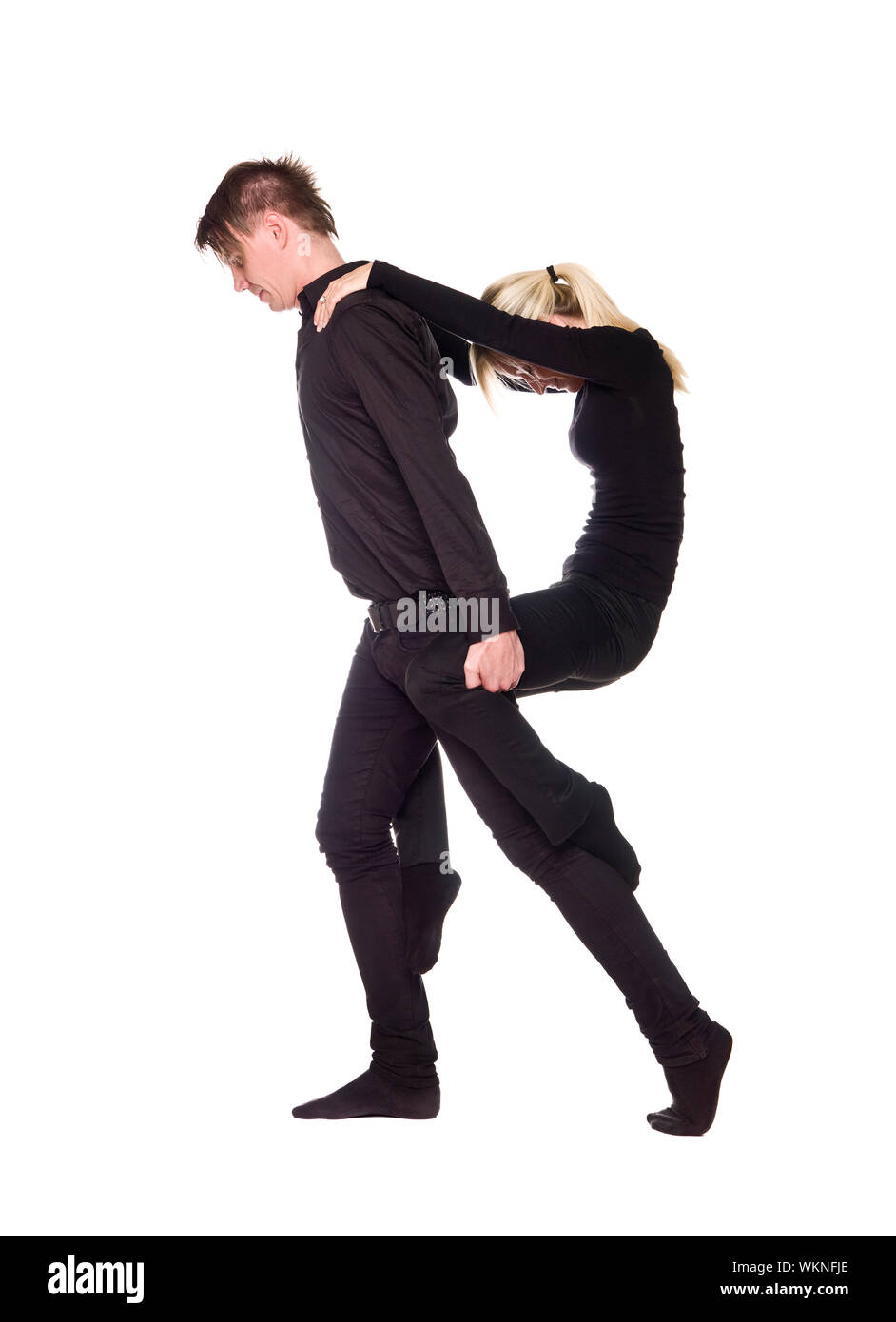 The letter 'R' formed by people dressed in black Stock Photo - Alamy