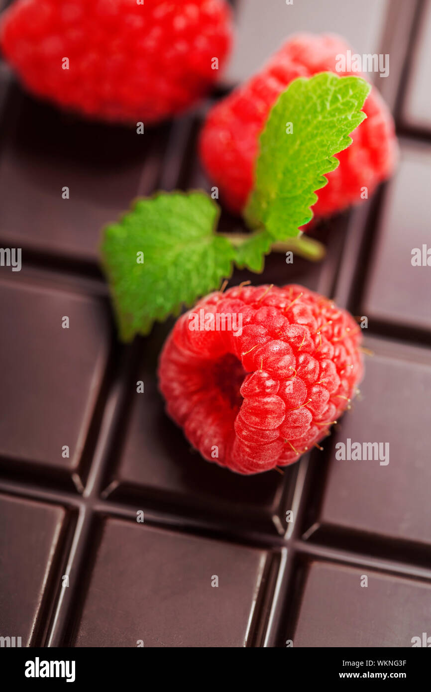 dark chocolate bar with raspberry Stock Photo - Alamy