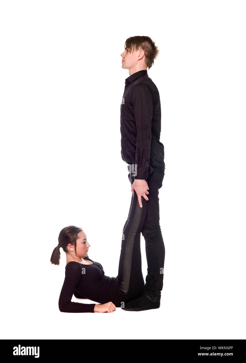 The letter 'J' formed by people dressed in black Stock Photo - Alamy