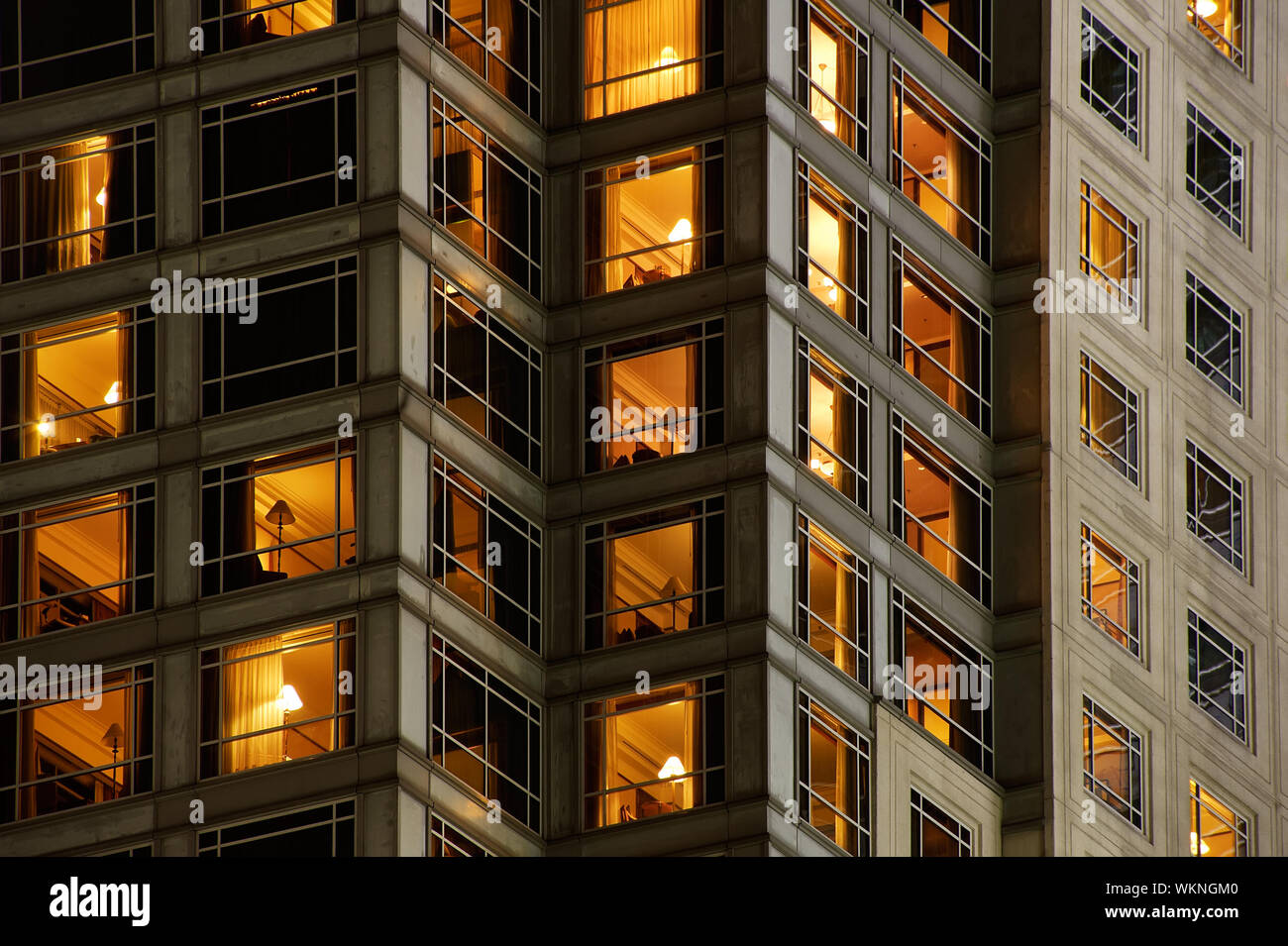 Apartment background with windows light in night Stock Photo - Alamy