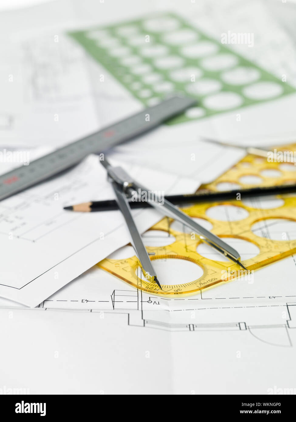 Drawing compass, pen and ruler on blueprints Stock Photo - Alamy
