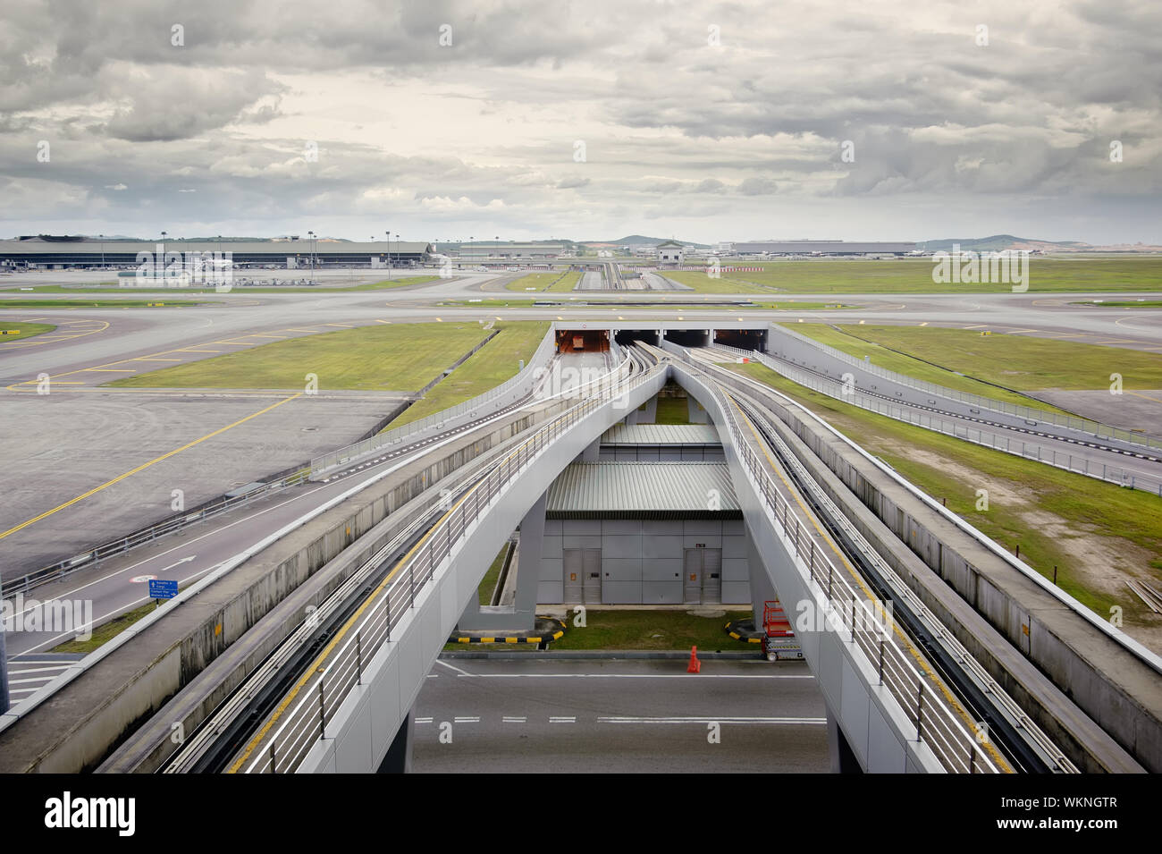 Spectacular scenery and airport runway underpass road transport with ...