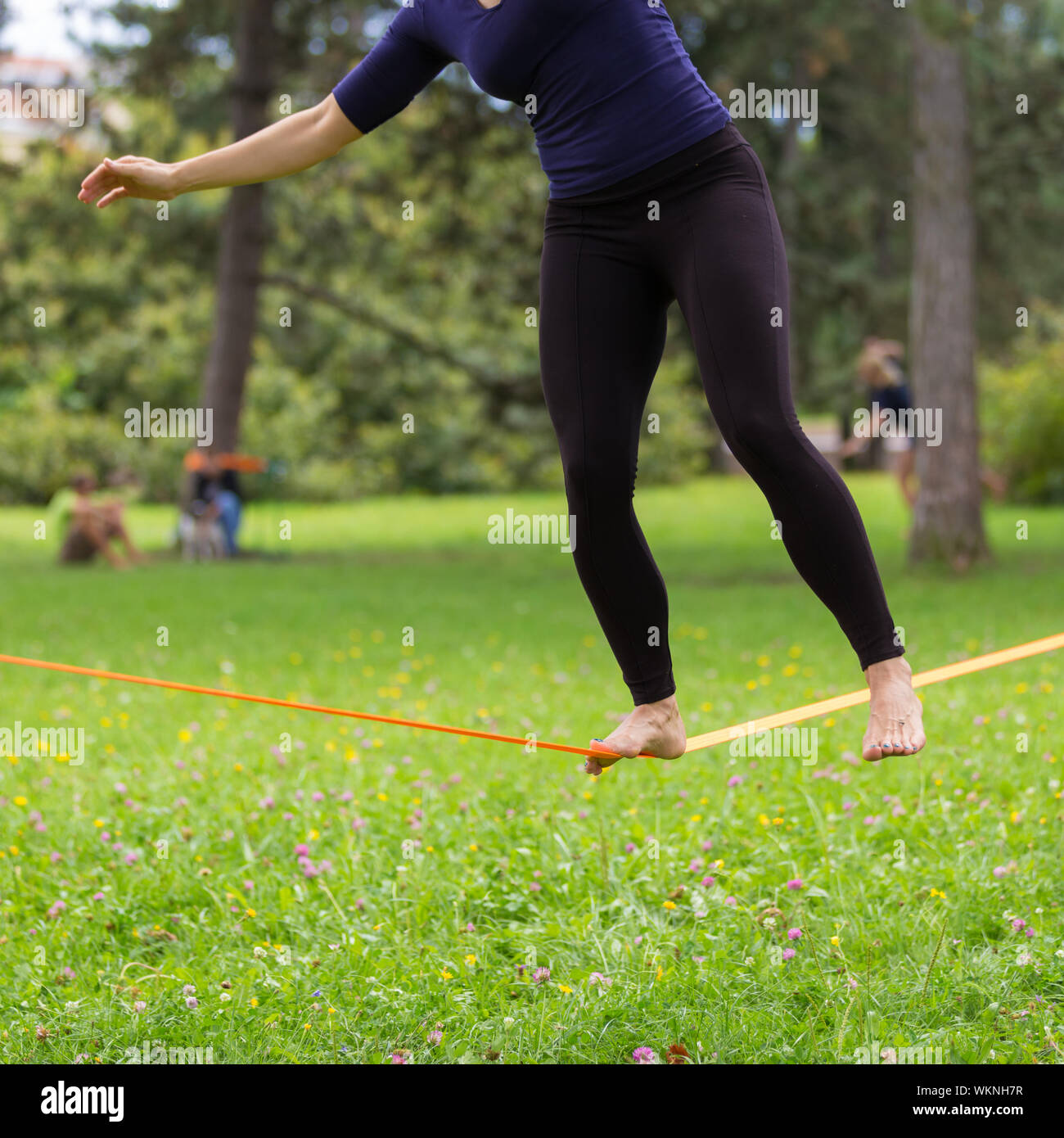 Slack line in the city park Stock Photo - Alamy