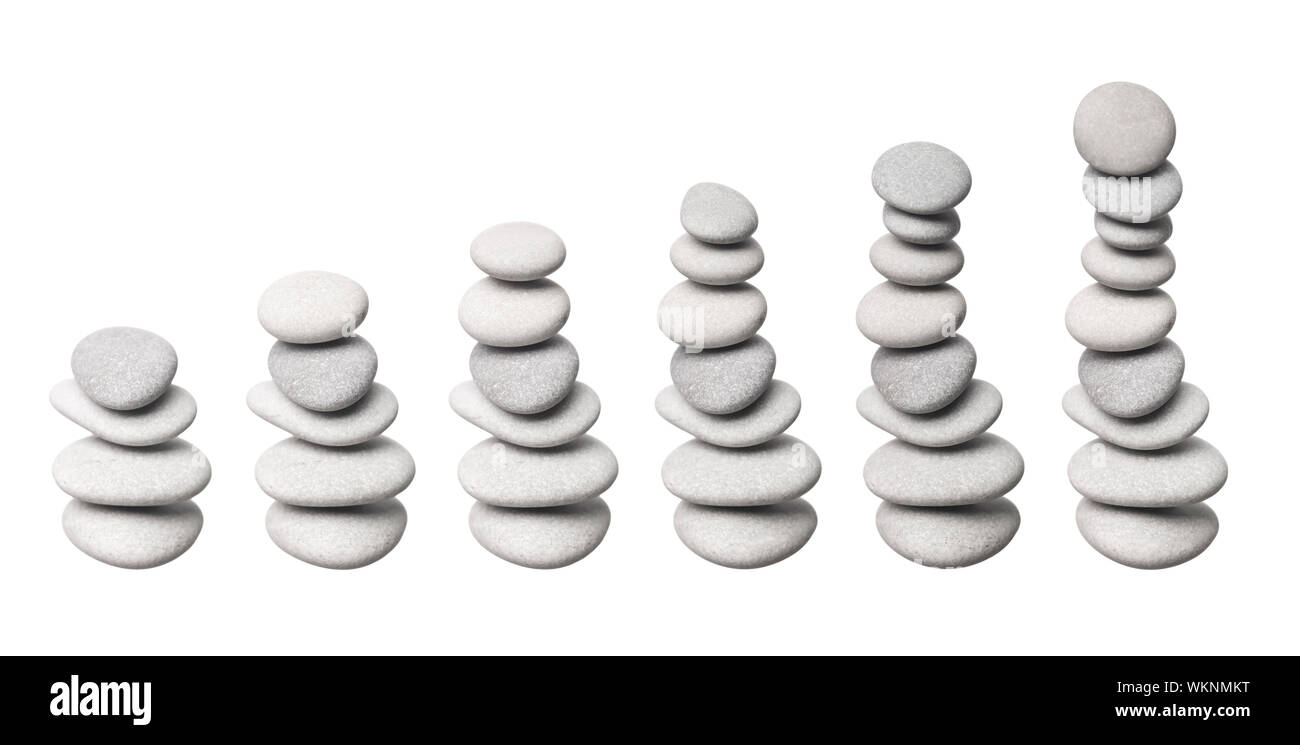 Stacked stones in progress, isolated on white background Stock Photo ...