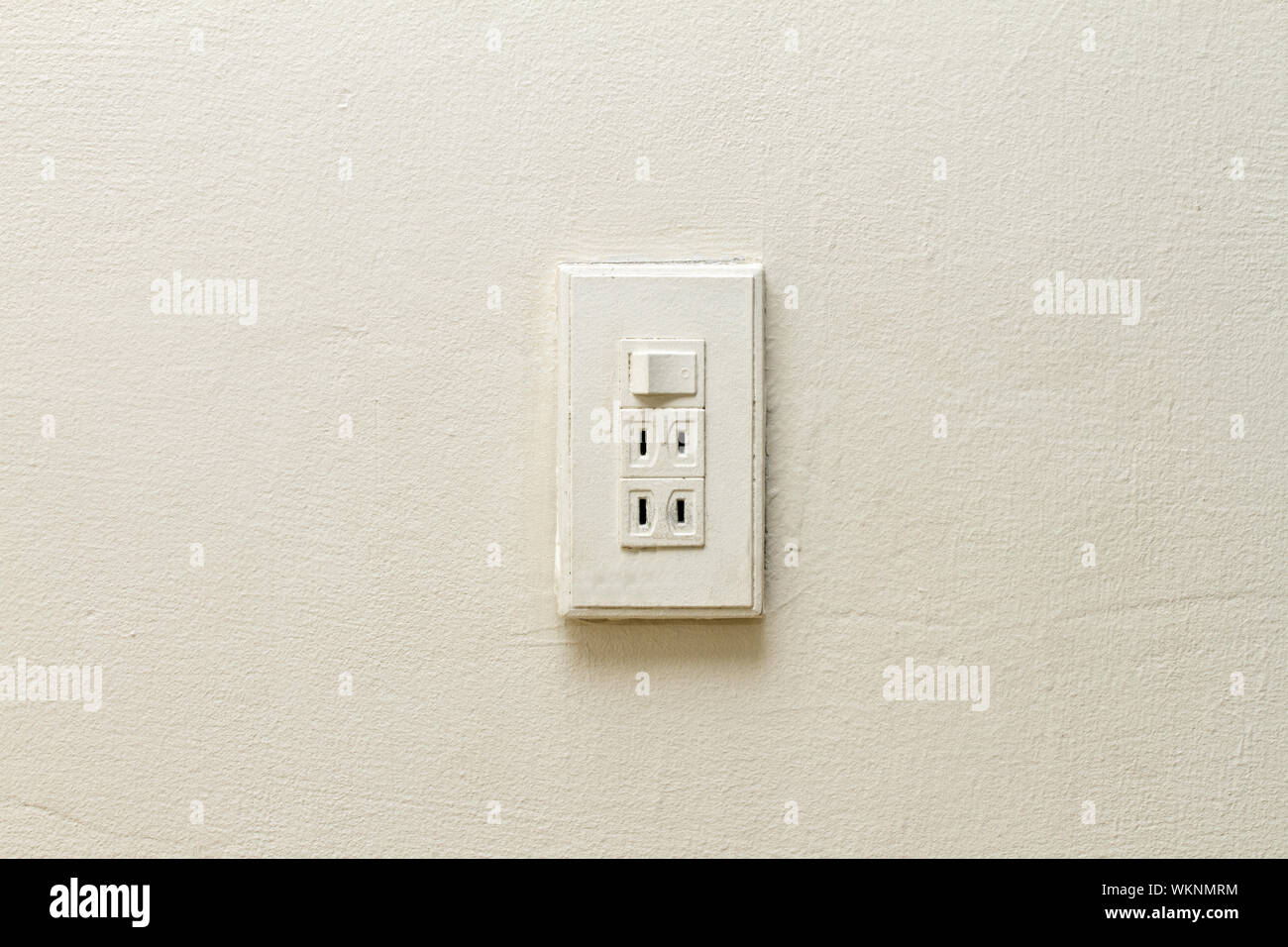 Electrical light and switch on the white wall socket Stock Photo - Alamy