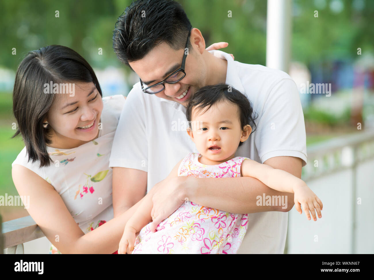 Happy Asian Family enjoying family time together in the park Stock ...