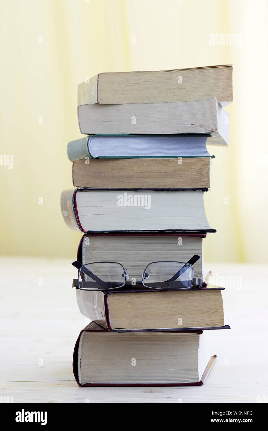 books stack and glasses Stock Photo - Alamy