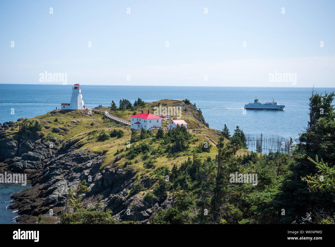 The Grand Manan V Ferry passing Swallowtail Lighthouse on the way into ...