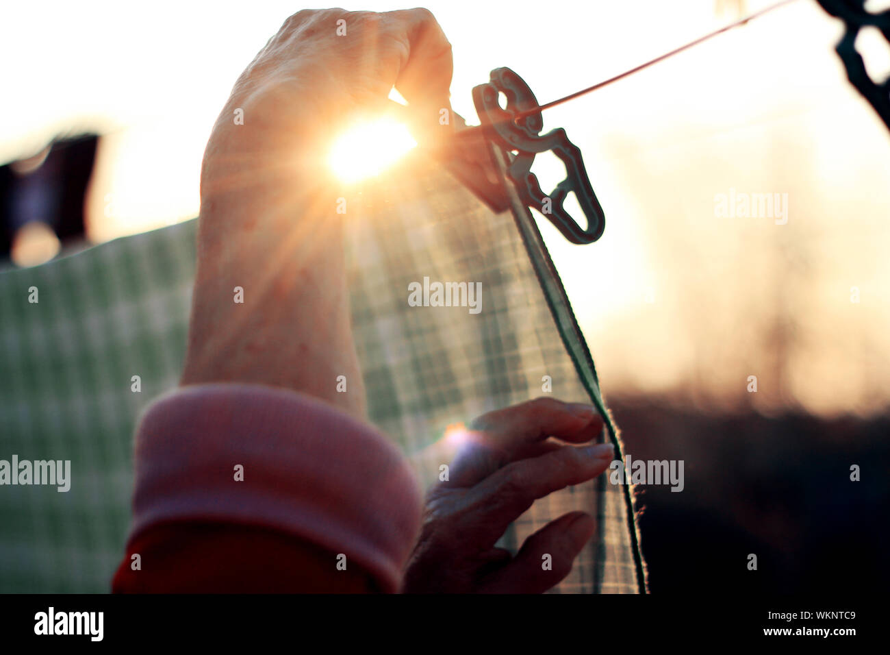 Woman hanging laundry line hi-res stock photography and images - Alamy