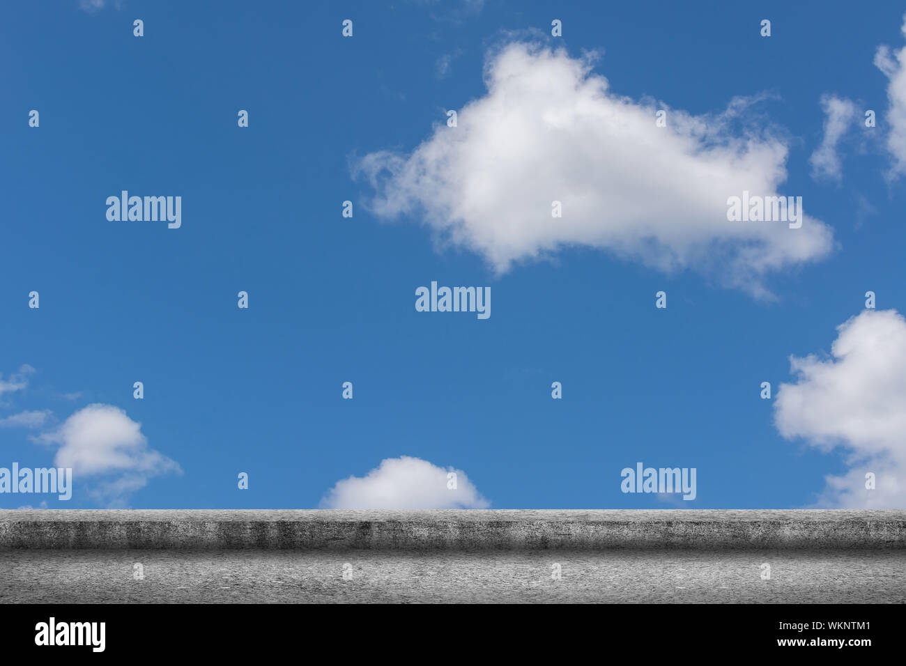Background of concrete ground with cloudy sky Stock Photo - Alamy