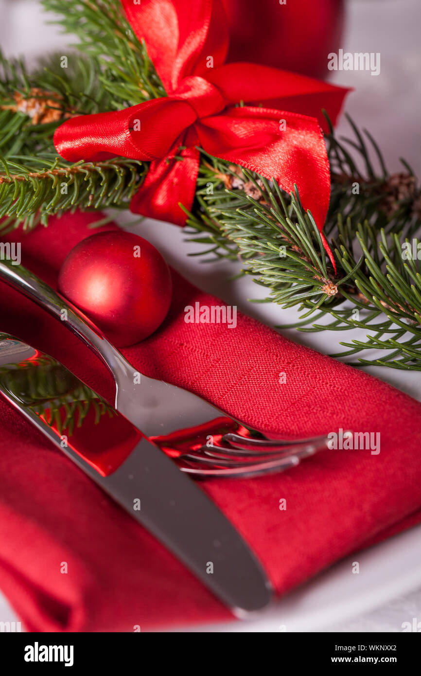Red themed Christmas place setting Stock Photo - Alamy