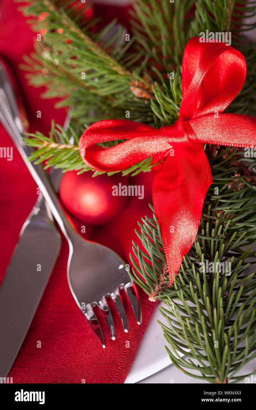 Red themed Christmas place setting Stock Photo - Alamy