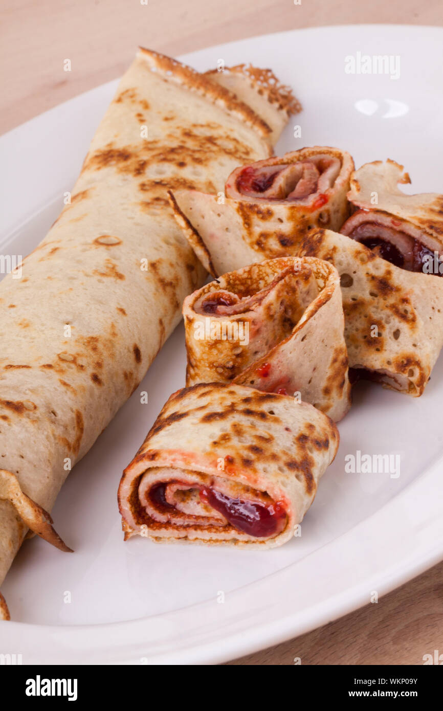 Rolled pancakes served on hi-res stock photography and images - Alamy