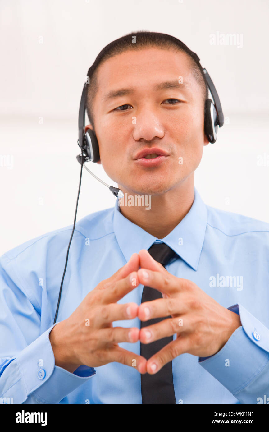 Customer service representative wearing headset hi-res stock ...